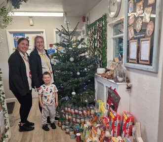 Rowan Tree Day Nursery make festive food bank donation